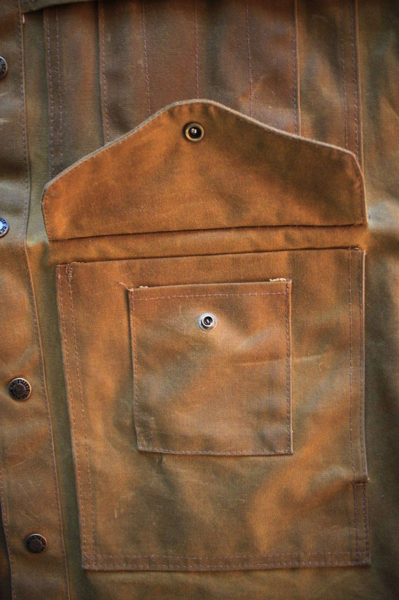 Filson Tin Cloth Cruiser Review After One Year of Wear | Stridewise